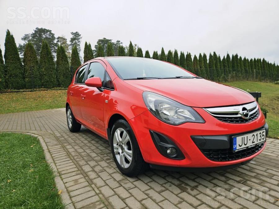Red Opel Corsa 2014 in Riga, with an engine capacity of 1.30 L and mileage of 241 thousand km for 3400 €, photo 3 on AUTOMOTO.COM.LV