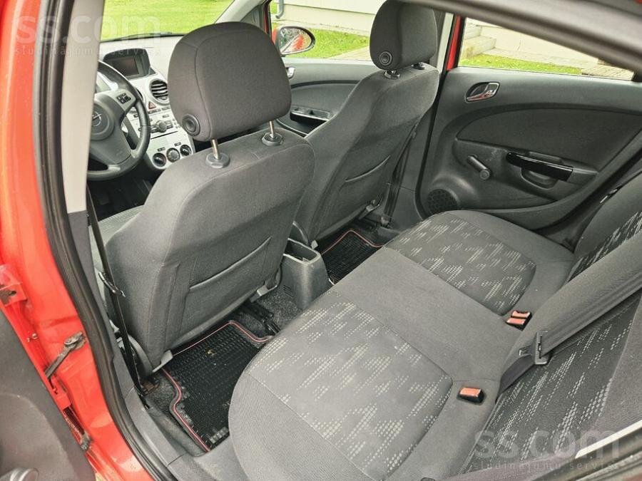Red Opel Corsa 2014 in Riga, with an engine capacity of 1.30 L and mileage of 241 thousand km for 3400 €, photo 8 on AUTOMOTO.COM.LV