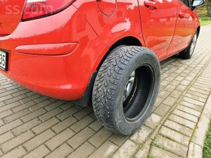 Red Opel Corsa 2014 in Riga, with an engine capacity of 1.30 L and mileage of 241 thousand km for 3400 €, photo 11 on AUTOMOTO.COM.LV