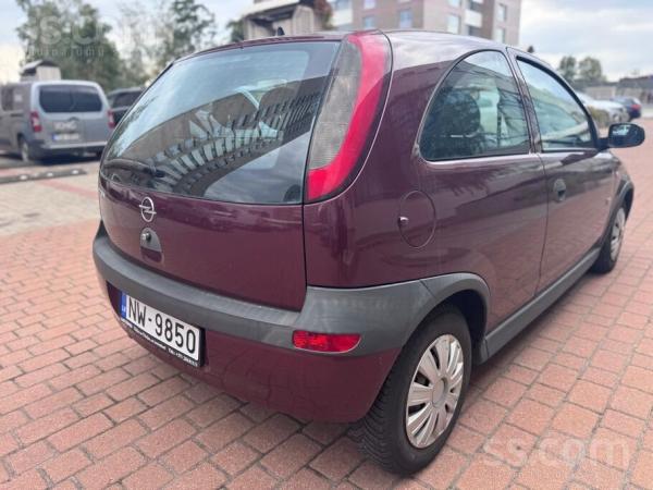 Violet Opel Corsa 2003 in Riga, with an engine capacity of 1.00 L and mileage of 0 thousand km for 1200 €, photo 6 on AUTOMOTO.COM.LV