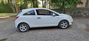 White Opel Corsa 2009 in Kedainiai, with an engine capacity of 1.36 L and mileage of 190 thousand km for 1100 €, photo 4 on AUTOMOTO.COM.LV