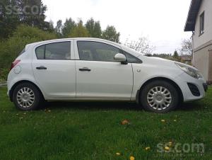 White Opel Corsa 2014 in Riga, with an engine capacity of 1.30 L and mileage of 191 thousand km for 2350 €, photo 7 on AUTOMOTO.COM.LV
