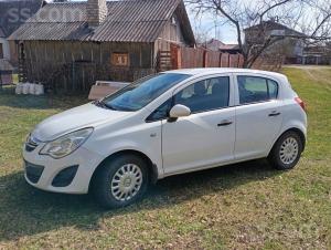 White Opel Corsa 2014 in Riga, with an engine capacity of 1.30 L and mileage of 191 thousand km for 2350 €, photo 12 on AUTOMOTO.COM.LV