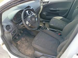 White Opel Corsa 2014 in Riga, with an engine capacity of 1.30 L and mileage of 191 thousand km for 2350 €, photo 14 on AUTOMOTO.COM.LV