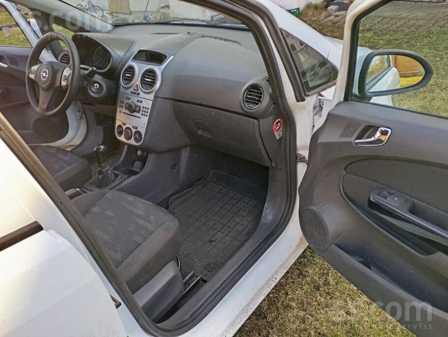 White Opel Corsa 2014 in Riga, with an engine capacity of 1.30 L and mileage of 191 thousand km for 2350 €, photo 18 on AUTOMOTO.COM.LV