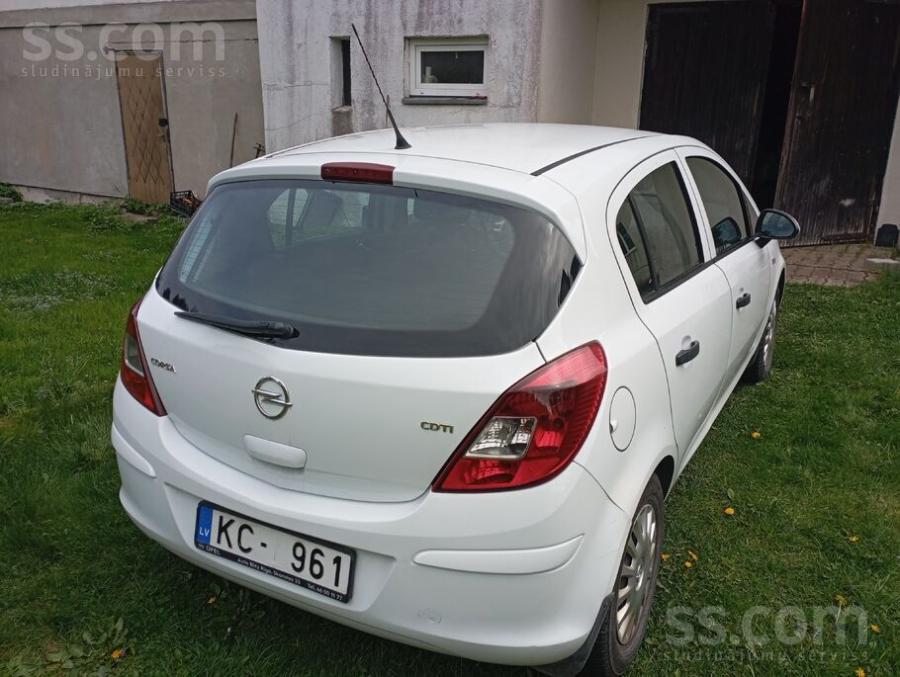 White Opel Corsa 2014 in Riga, with an engine capacity of 1.30 L and mileage of 191 thousand km for 2350 €, photo 27 on AUTOMOTO.COM.LV