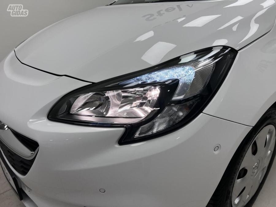 White Opel Corsa 2019 in Vilnius, with an engine capacity of 1.40 L and mileage of 130 thousand km for 7700 €, photo 5 on AUTOMOTO.COM.LV