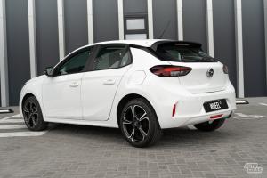 White Opel Corsa 2020 in Vilnius, with an engine capacity of 1.20 L and mileage of 66 thousand km for 9500 €, photo 4 on AUTOMOTO.COM.LV