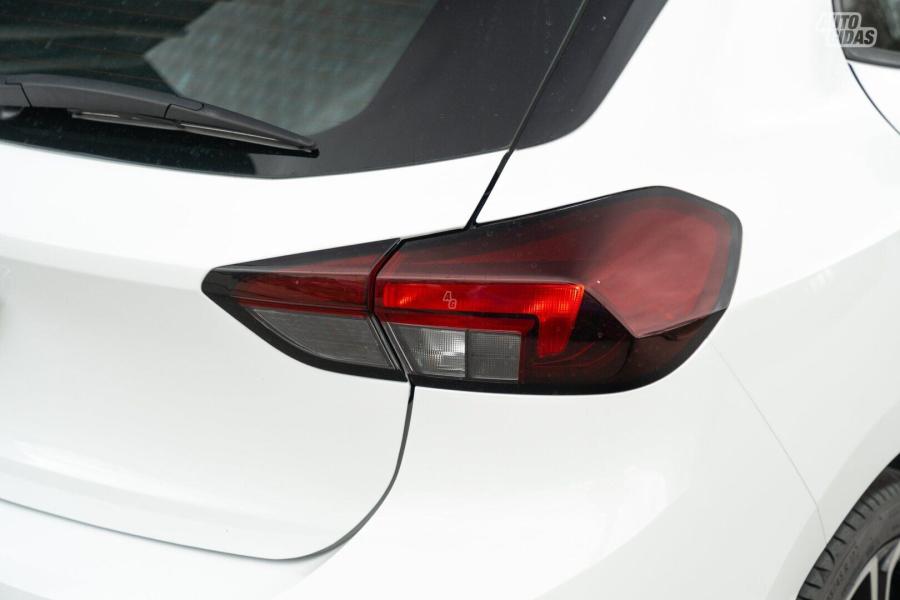 White Opel Corsa 2020 in Vilnius, with an engine capacity of 1.20 L and mileage of 66 thousand km for 9500 €, photo 11 on AUTOMOTO.COM.LV
