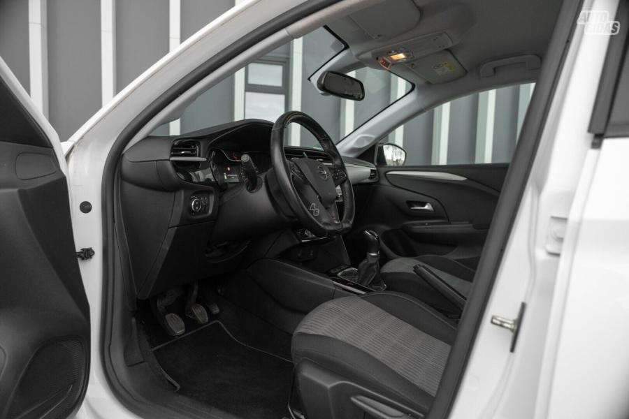 White Opel Corsa 2020 in Vilnius, with an engine capacity of 1.20 L and mileage of 66 thousand km for 9500 €, photo 14 on AUTOMOTO.COM.LV