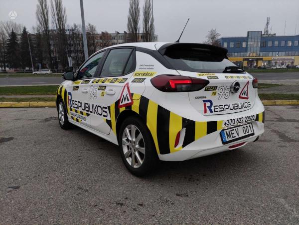 White Opel Corsa 2021 in Klaipeda, with an engine capacity of 1.20 L and mileage of 82 thousand km for 5973 €, photo 3 on AUTOMOTO.COM.LV