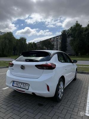 White Opel Corsa 2021 in Kaunas, with an engine capacity of 1.50 L and mileage of 165 thousand km for 6850 €, photo 5 on AUTOMOTO.COM.LV