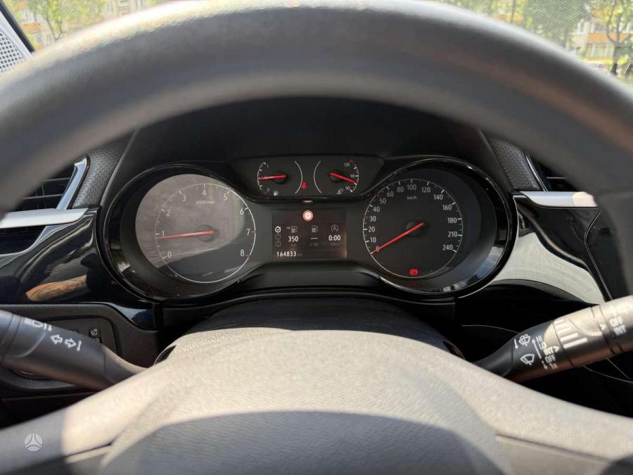 White Opel Corsa 2021 in Kaunas, with an engine capacity of 1.50 L and mileage of 165 thousand km for 6850 €, photo 12 on AUTOMOTO.COM.LV