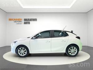 White Opel Corsa 2021 in Riga, with an engine capacity of 1.20 L and mileage of 97 thousand km for 8490 €, photo 4 on AUTOMOTO.COM.LV