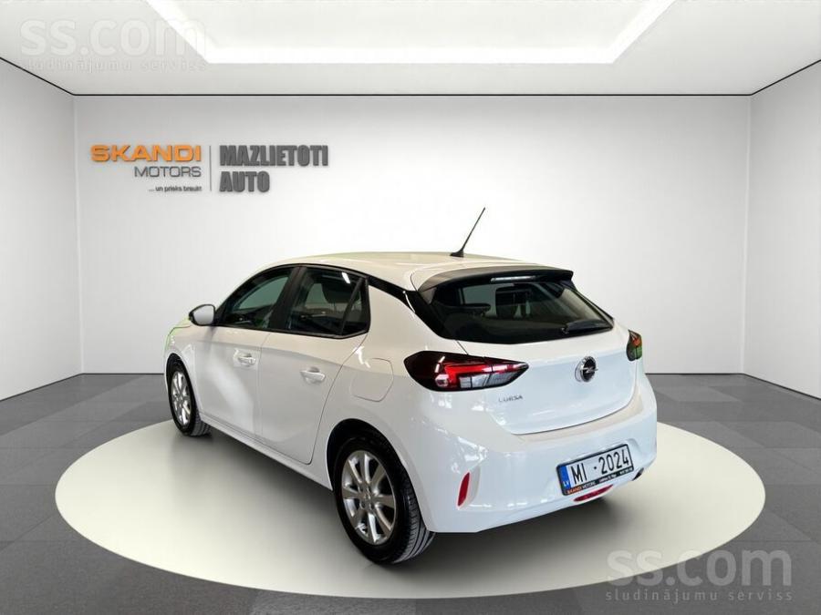 White Opel Corsa 2021 in Riga, with an engine capacity of 1.20 L and mileage of 97 thousand km for 8490 €, photo 5 on AUTOMOTO.COM.LV