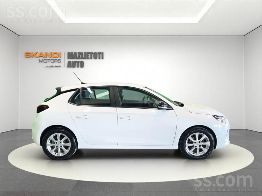 White Opel Corsa 2021 in Riga, with an engine capacity of 1.20 L and mileage of 97 thousand km for 8490 €, photo 8 on AUTOMOTO.COM.LV