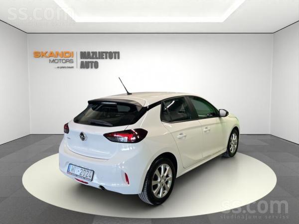 White Opel Corsa 2021 in Riga, with an engine capacity of 1.20 L and mileage of 97 thousand km for 8490 €, photo 7 on AUTOMOTO.COM.LV