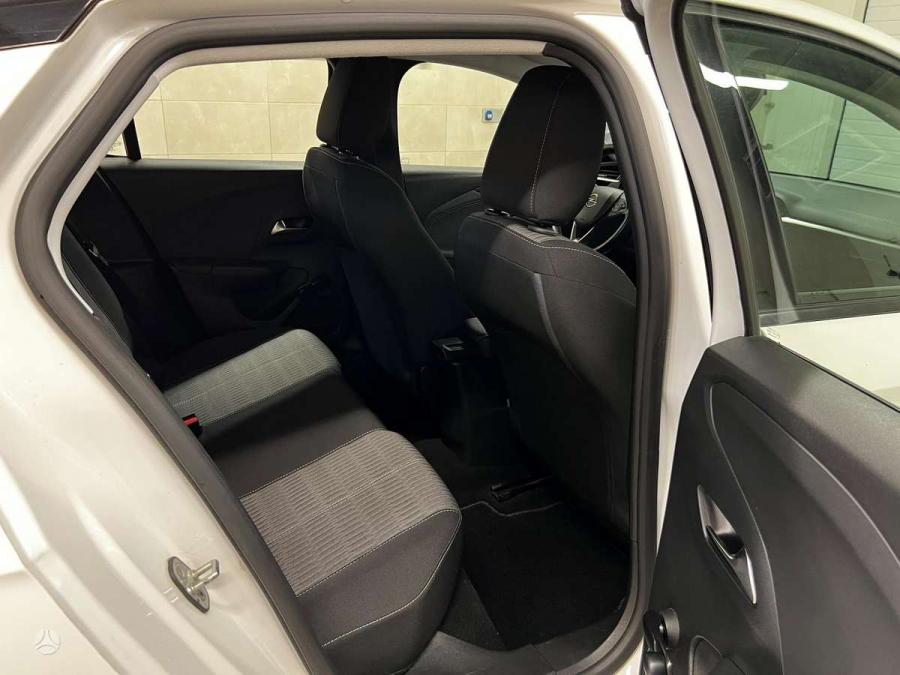 White Opel Corsa 2022 in Marijampole, with an engine capacity of 1.20 L and mileage of 109 thousand km for 7623 €, photo 14 on AUTOMOTO.COM.LV