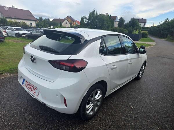 White Opel Corsa 2022 in Vilnius, with an engine capacity of 1.20 L and mileage of 103 thousand km for 7500 €, photo 2 on AUTOMOTO.COM.LV