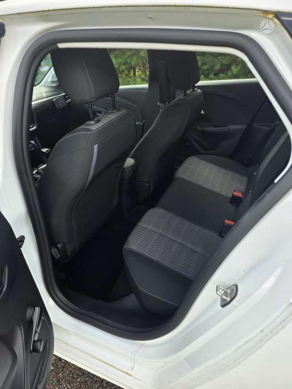 White Opel Corsa 2022 in Vilnius, with an engine capacity of 1.20 L and mileage of 103 thousand km for 7500 €, photo 8 on AUTOMOTO.COM.LV