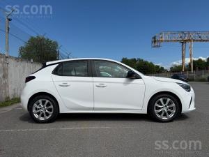 White Opel Corsa 2023 in Riga, with an engine capacity of 1.50 L and mileage of 110 thousand km for 11500 €, photo 5 on AUTOMOTO.COM.LV