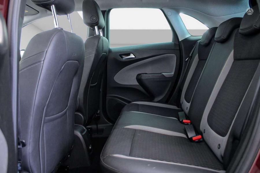 Red Opel Crossland 2018 in Kaunas, with an engine capacity of 1.20 L and mileage of 145 thousand km for 8990 €, photo 7 on AUTOMOTO.COM.LV