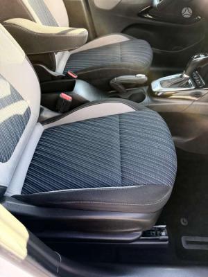 White Opel Crossland 2019 in Taurage, with an engine capacity of 1.20 L and mileage of 119 thousand km for 7500 €, photo 21 on AUTOMOTO.COM.LV