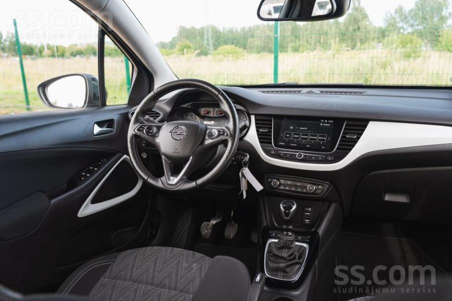 Black Opel Crossland X 2020 in Riga, with an engine capacity of 1.20 L and mileage of 158 thousand km for 9900 €, photo 11 on AUTOMOTO.COM.LV