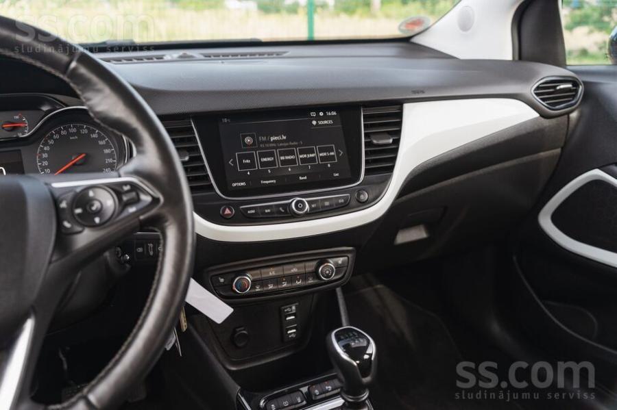 Black Opel Crossland X 2020 in Riga, with an engine capacity of 1.20 L and mileage of 158 thousand km for 9900 €, photo 18 on AUTOMOTO.COM.LV
