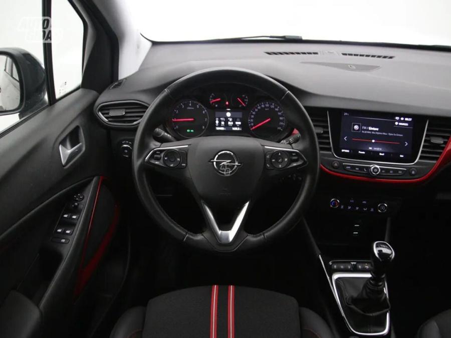 Black Opel Crossland X 2021 in Vilnius, with an engine capacity of 1.20 L and mileage of 124 thousand km for 10999 €, photo 18 on AUTOMOTO.COM.LV