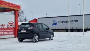 Black Opel Crossland X 2018 in Jelgava, with an engine capacity of 1.20 L and mileage of 101 thousand km for 8950 €, photo 6 on AUTOMOTO.COM.LV