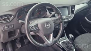 Black Opel Crossland X 2018 in Jelgava, with an engine capacity of 1.20 L and mileage of 101 thousand km for 8950 €, photo 31 on AUTOMOTO.COM.LV