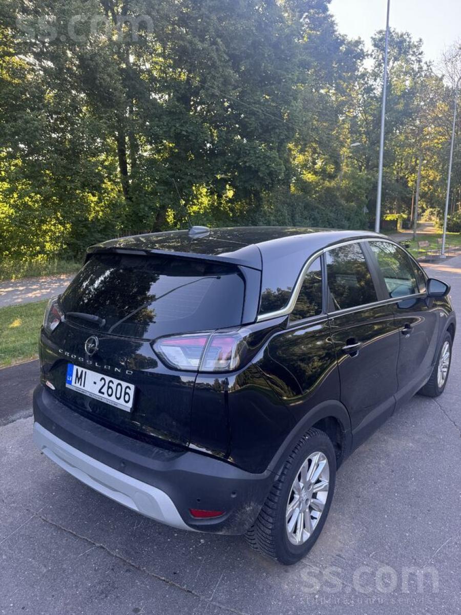 Black Opel Crossland X 2021 in Riga, with an engine capacity of 1.20 L and mileage of 39 thousand km for 13450 €, photo 6 on AUTOMOTO.COM.LV