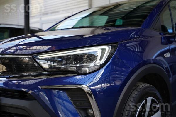 Blue Opel Crossland X 2021 in Riga, with an engine capacity of 1.20 L and mileage of 128 thousand km for 9990 €, photo 7 on AUTOMOTO.COM.LV