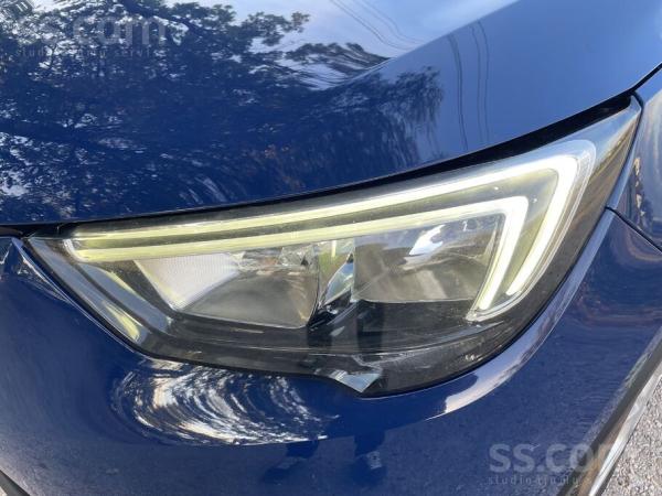 Blue Opel Crossland X 2019 in Riga, with an engine capacity of 1.20 L and mileage of 213 thousand km for 7990 €, photo 9 on AUTOMOTO.COM.LV
