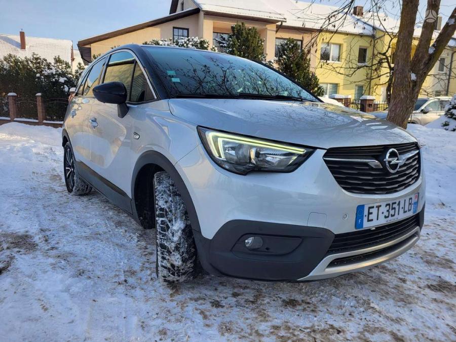 Grey Opel Crossland X 2018 in Utena, with an engine capacity of 1.20 L and mileage of 152 thousand km for 6150 €, photo 1 on AUTOMOTO.COM.LV