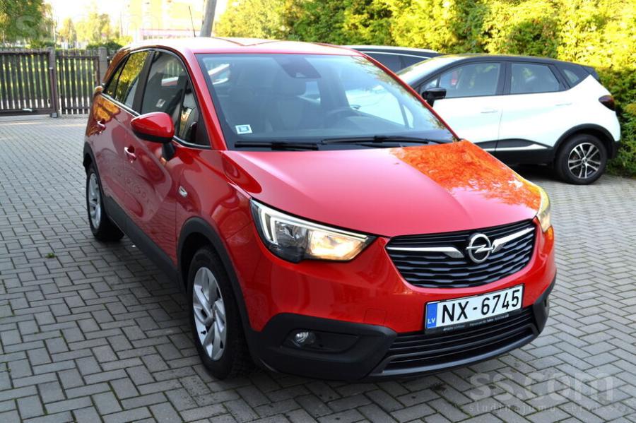 Red Opel Crossland X 2018 in Riga, with an engine capacity of 1.20 L and mileage of 125 thousand km for 9200 €, photo 2 on AUTOMOTO.COM.LV