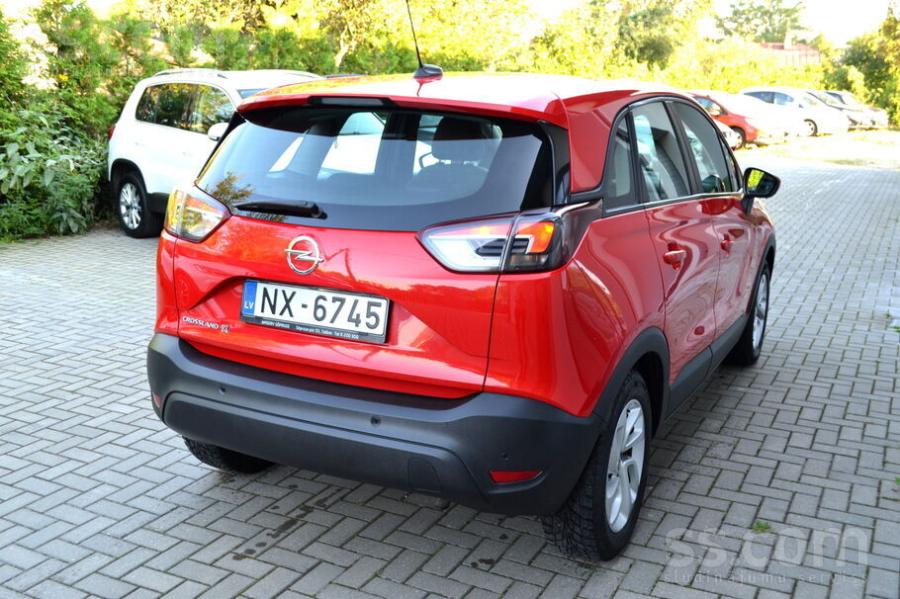 Red Opel Crossland X 2018 in Riga, with an engine capacity of 1.20 L and mileage of 125 thousand km for 9200 €, photo 3 on AUTOMOTO.COM.LV