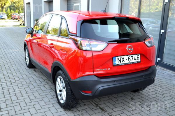 Red Opel Crossland X 2018 in Riga, with an engine capacity of 1.20 L and mileage of 125 thousand km for 9200 €, photo 4 on AUTOMOTO.COM.LV