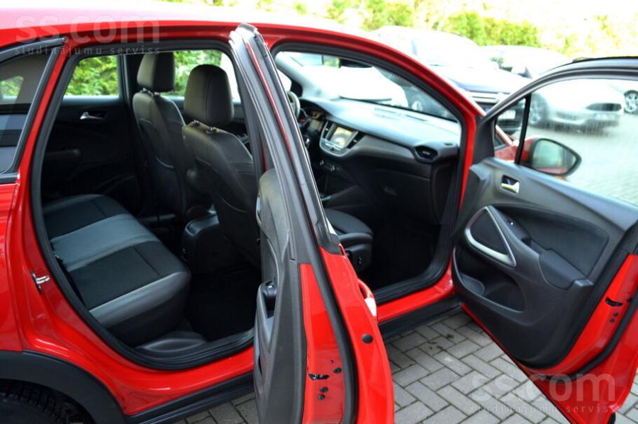 Red Opel Crossland X 2018 in Riga, with an engine capacity of 1.20 L and mileage of 125 thousand km for 9200 €, photo 10 on AUTOMOTO.COM.LV