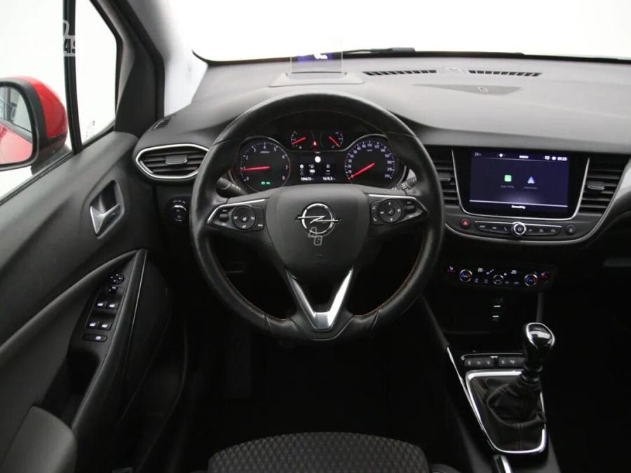 Red Opel Crossland X 2018 in Vilnius, with an engine capacity of 1.20 L and mileage of 105 thousand km for 9099 €, photo 18 on AUTOMOTO.COM.LV