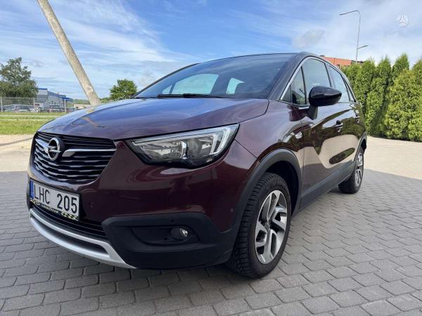 Red Opel Crossland X 2018 in Kretinga, with an engine capacity of 1.20 L and mileage of 82 thousand km for 7795 €, photo 4 on AUTOMOTO.COM.LV