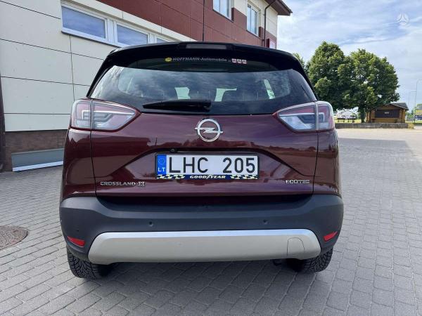Red Opel Crossland X 2018 in Kretinga, with an engine capacity of 1.20 L and mileage of 82 thousand km for 7795 €, photo 8 on AUTOMOTO.COM.LV