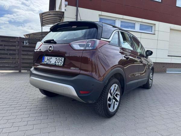 Red Opel Crossland X 2018 in Kretinga, with an engine capacity of 1.20 L and mileage of 82 thousand km for 7795 €, photo 9 on AUTOMOTO.COM.LV