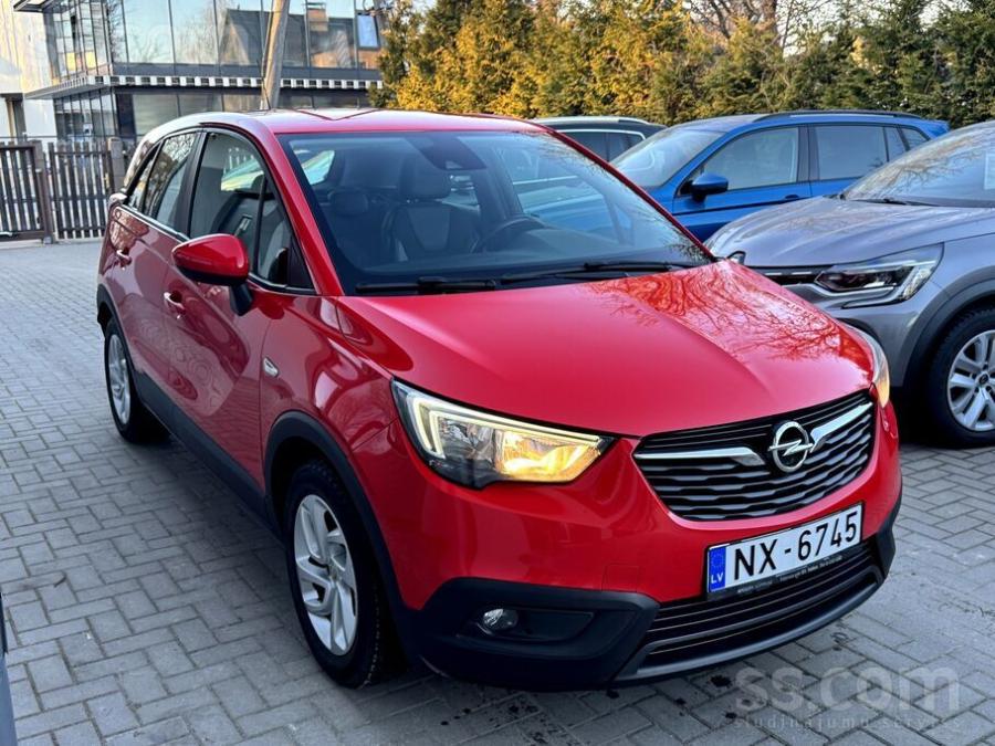 Red Opel Crossland X 2018 in Riga, with an engine capacity of 1.20 L and mileage of 125 thousand km for 8300 €, photo 3 on AUTOMOTO.COM.LV