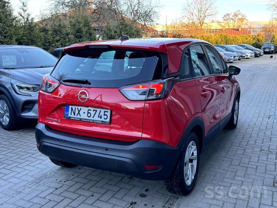 Red Opel Crossland X 2018 in Riga, with an engine capacity of 1.20 L and mileage of 125 thousand km for 8300 €, photo 4 on AUTOMOTO.COM.LV