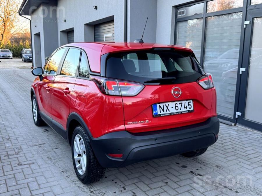 Red Opel Crossland X 2018 in Riga, with an engine capacity of 1.20 L and mileage of 125 thousand km for 8300 €, photo 5 on AUTOMOTO.COM.LV