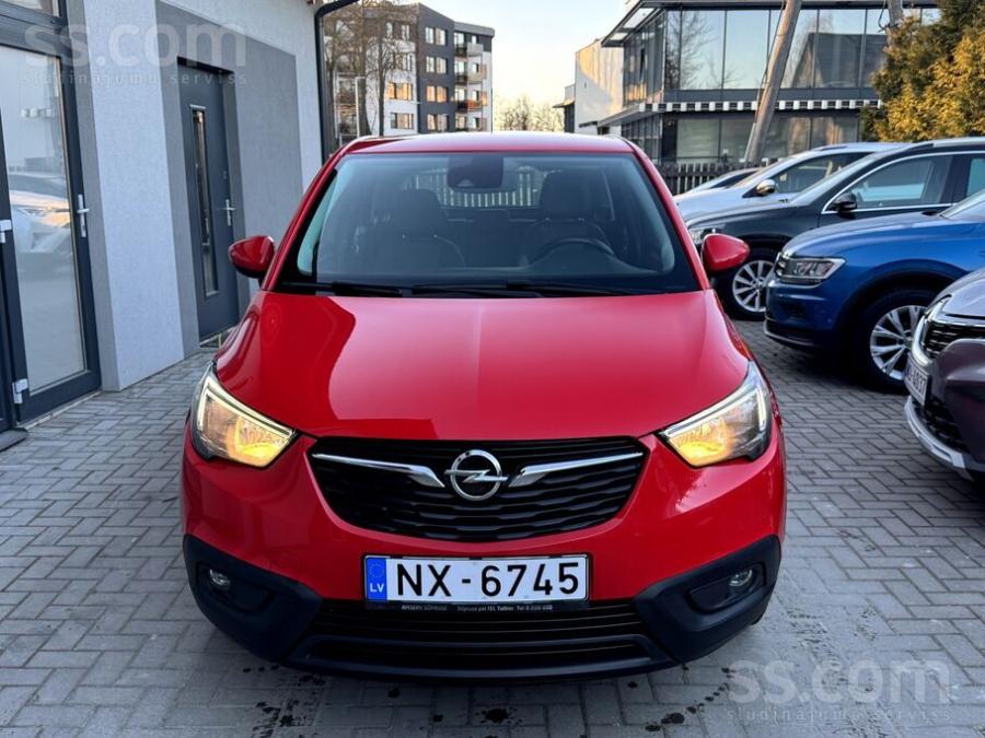 Red Opel Crossland X 2018 in Riga, with an engine capacity of 1.20 L and mileage of 125 thousand km for 8300 €, photo 7 on AUTOMOTO.COM.LV
