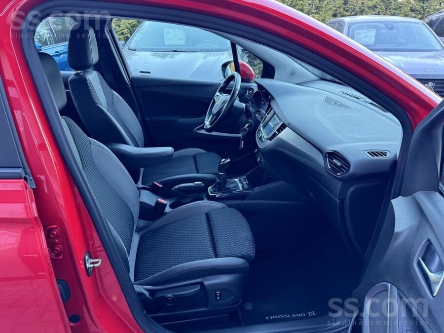 Red Opel Crossland X 2018 in Riga, with an engine capacity of 1.20 L and mileage of 125 thousand km for 8300 €, photo 10 on AUTOMOTO.COM.LV