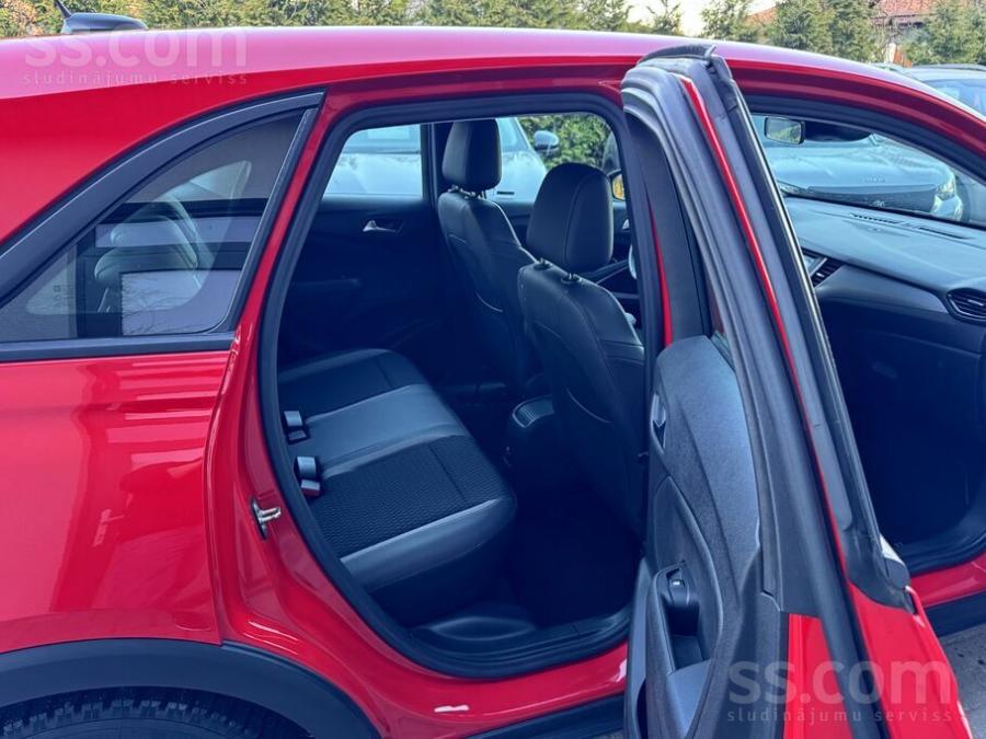 Red Opel Crossland X 2018 in Riga, with an engine capacity of 1.20 L and mileage of 125 thousand km for 8300 €, photo 11 on AUTOMOTO.COM.LV